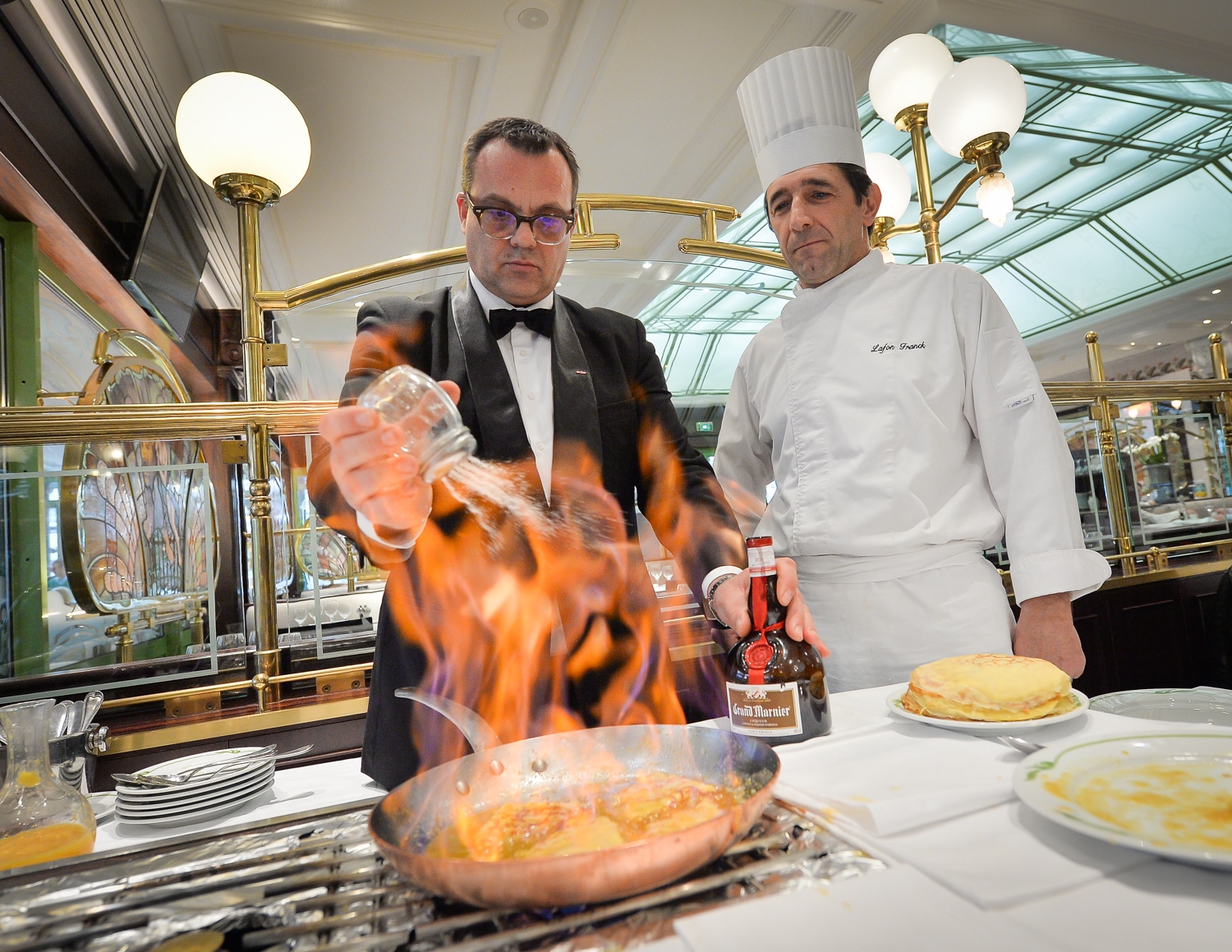Enjoy Crêpe Suzette at the Café de Paris - HORUS DVCS